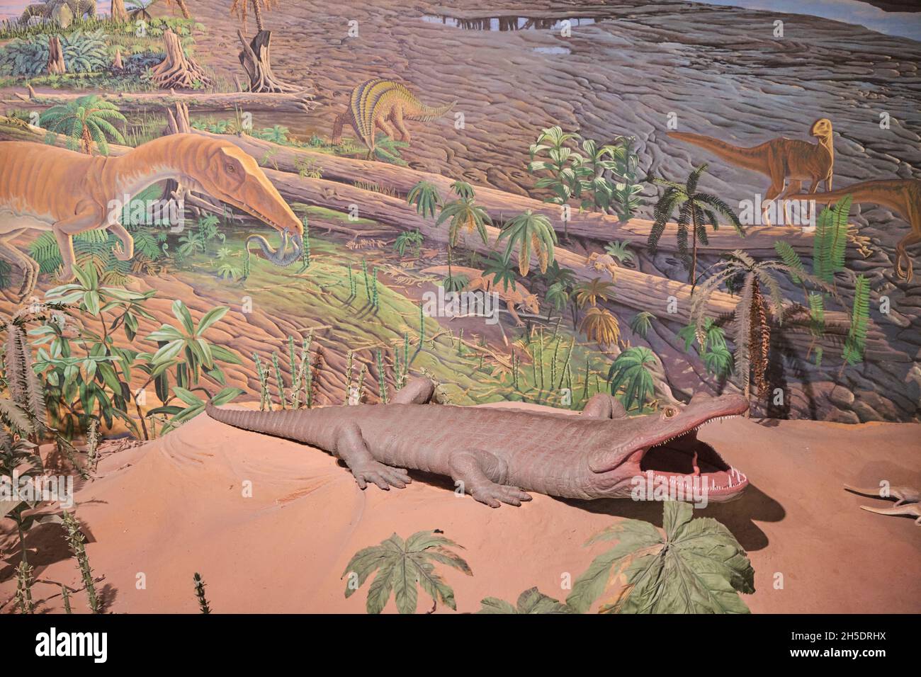 A Triassic era mural, diorama with a Phytosaur model. At Dinosaur State ...