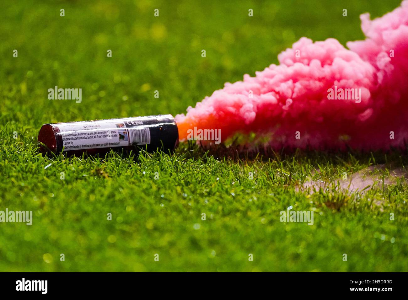 Smoke bomb on football pitch hi-res stock photography and images - Alamy