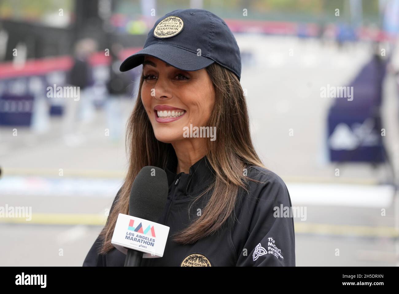 KTLA 5 television news reporter Megan Henderson at the finish line of ...