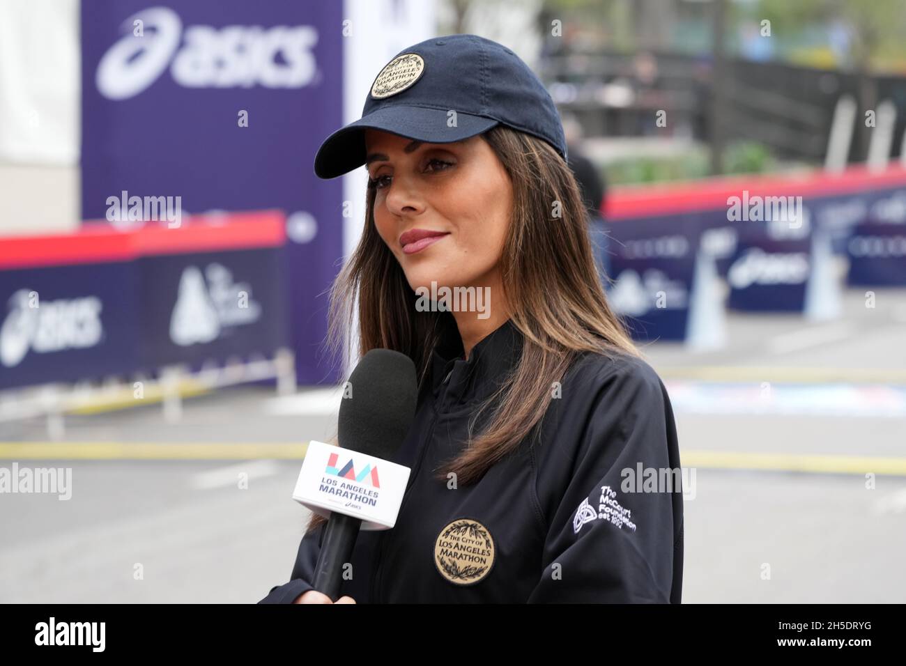 KTLA 5 television news reporter Megan Henderson at the finish line of ...
