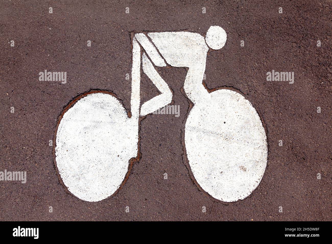 Bicycle sign on the pavement Stock Photo - Alamy