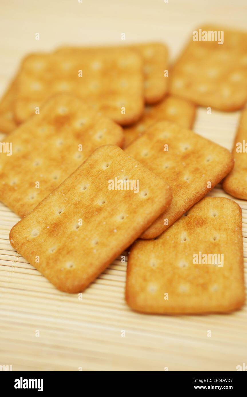 Vertical shot of salty crackers in square shape Stock Photo - Alamy