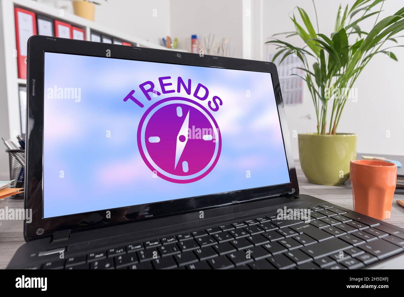 Laptop screen with trends concept Stock Photo - Alamy