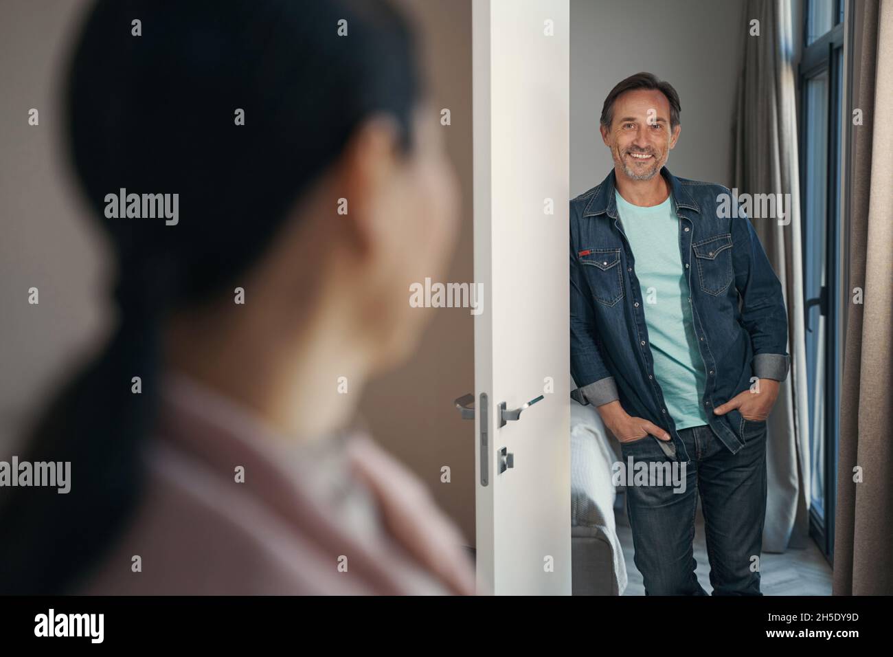 Happy man looking with love at wife Stock Photo - Alamy