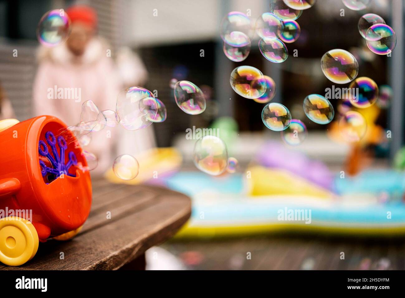 Bubble machine for party creating a beautiful bokeh with soap bubbles ...