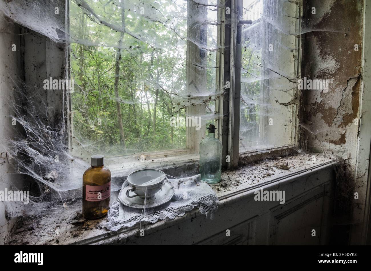 medicine stands on a window with cobwebs Stock Photo - Alamy