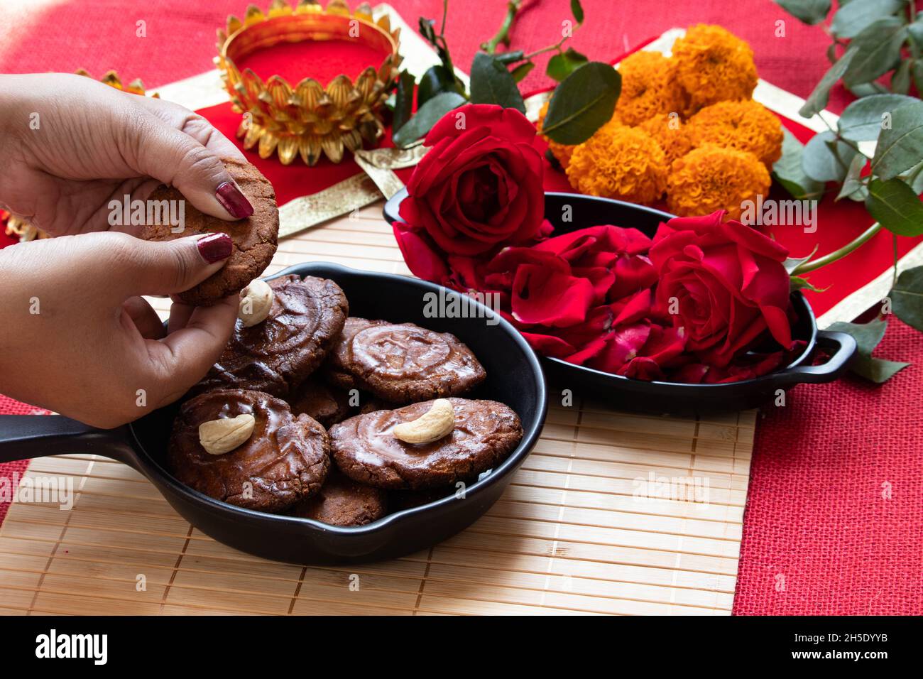 Hands Of Girl Holding Indian Mithai Thekua Thokwa Or Thekuwa Is Made Of ...