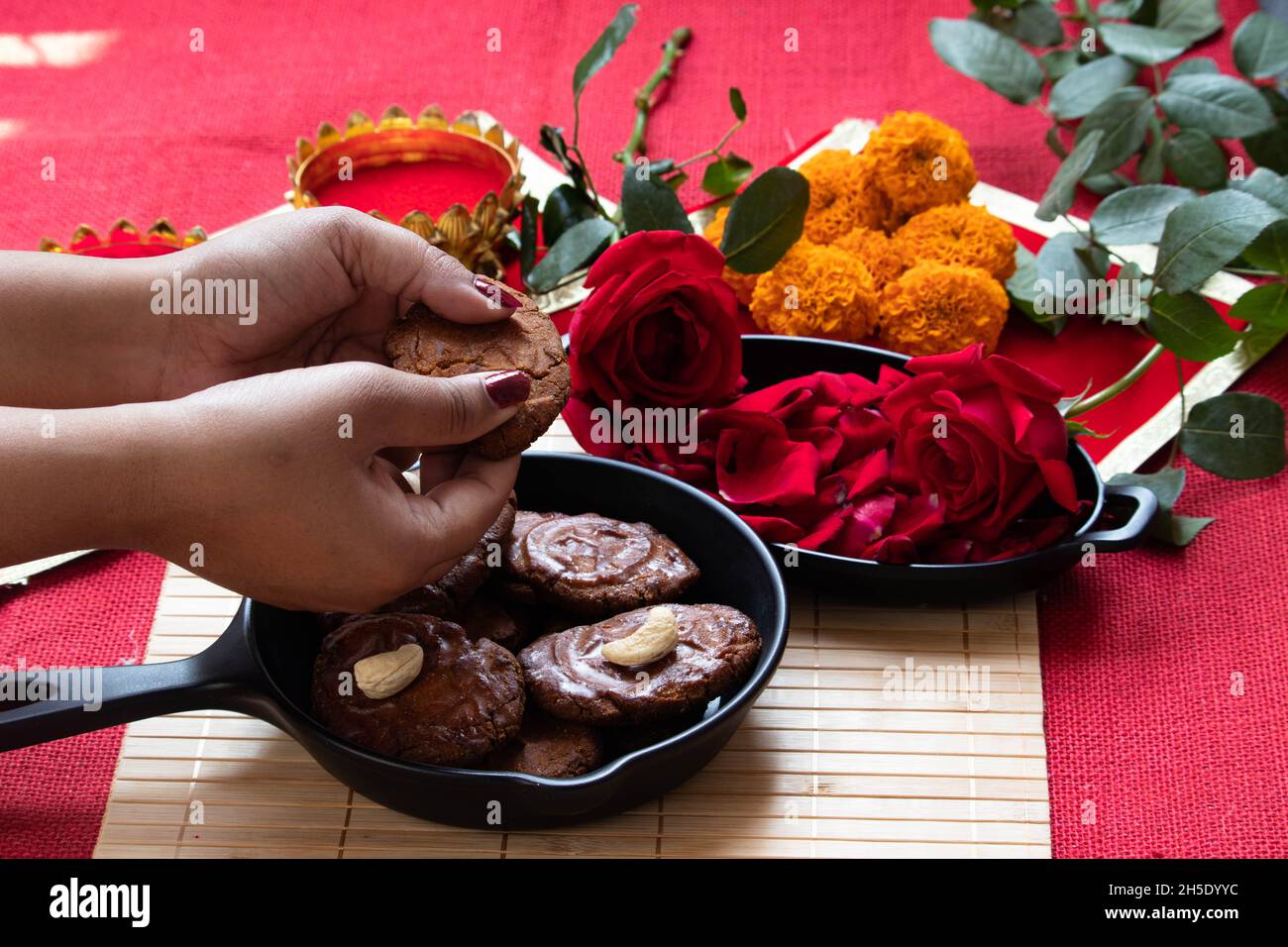 Hands Of Girl Holding Indian Mithai Thekua Thokwa Or Thekuwa Is Made Of ...
