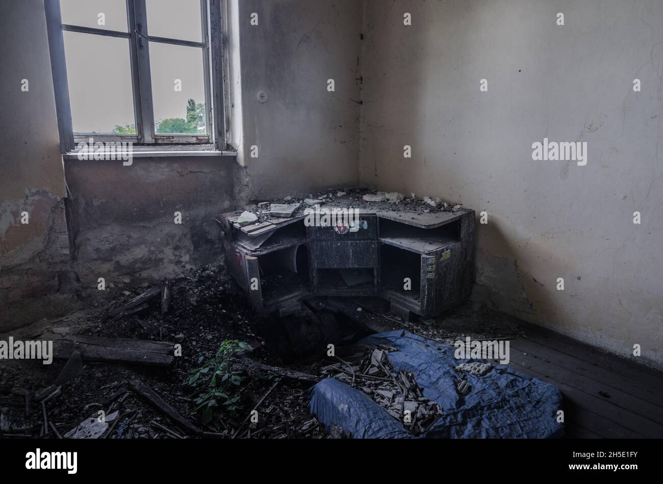 furniture in collapsed old room Stock Photo - Alamy