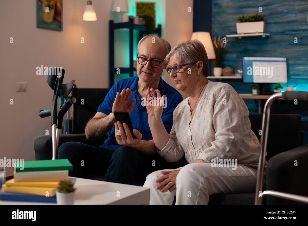 Senior married adults using video call technology for online conference ...