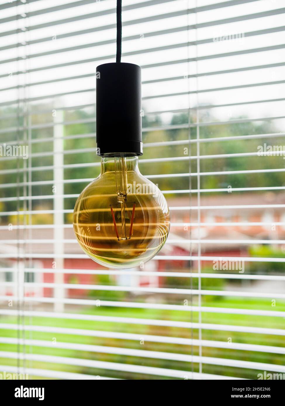 Light bulb hanging hi-res stock photography and images - Alamy
