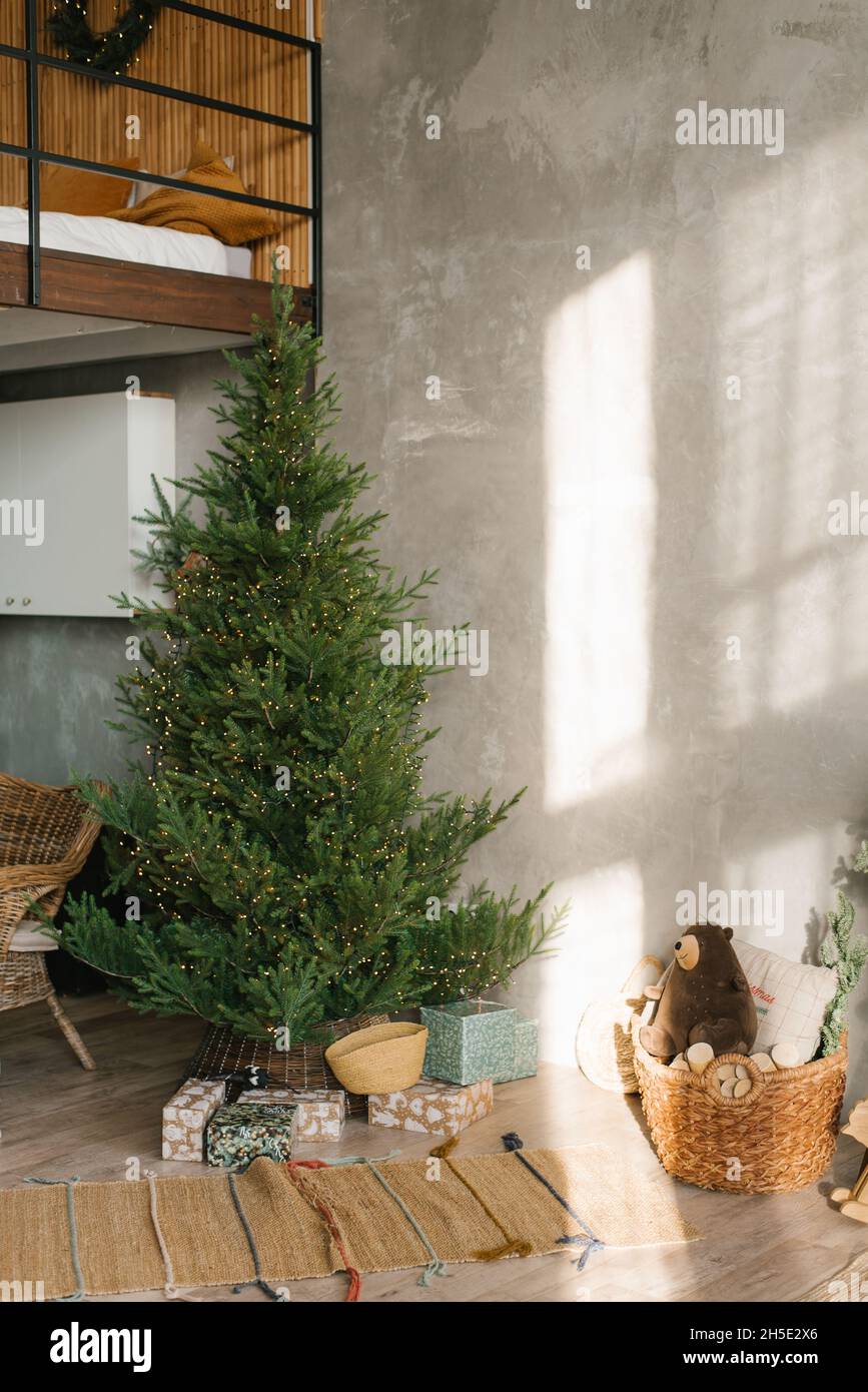 Christmas tree without toys in the Scandinavian-style living room ...