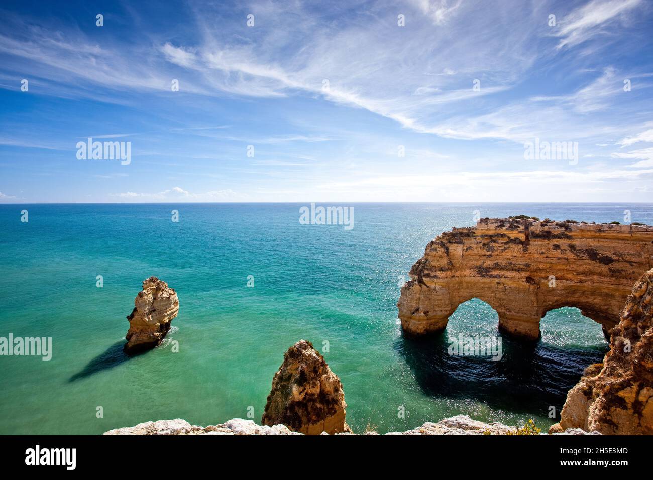 Calm seas arches Algarve coast Stock Photo - Alamy