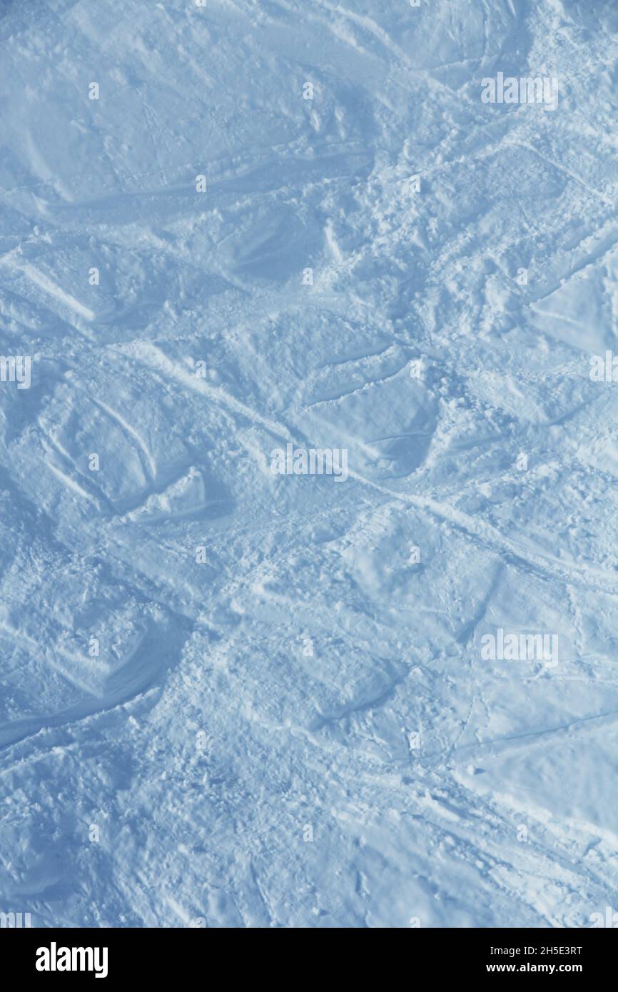 Tracks on snow in mountains alpine skiing snowboarding background ...