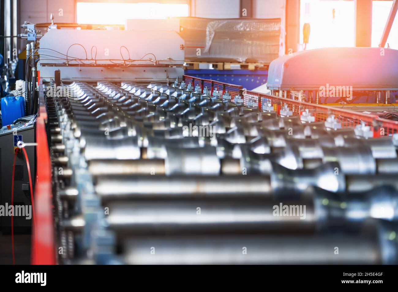 Production line of metal tile for roof. Steel forming machine in ...