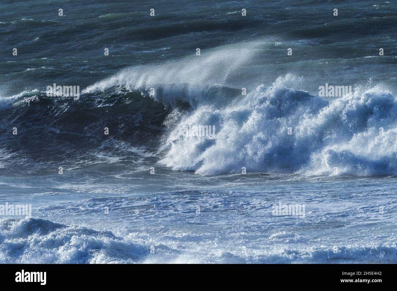 A wave breaking in offshore wind Stock Photo - Alamy