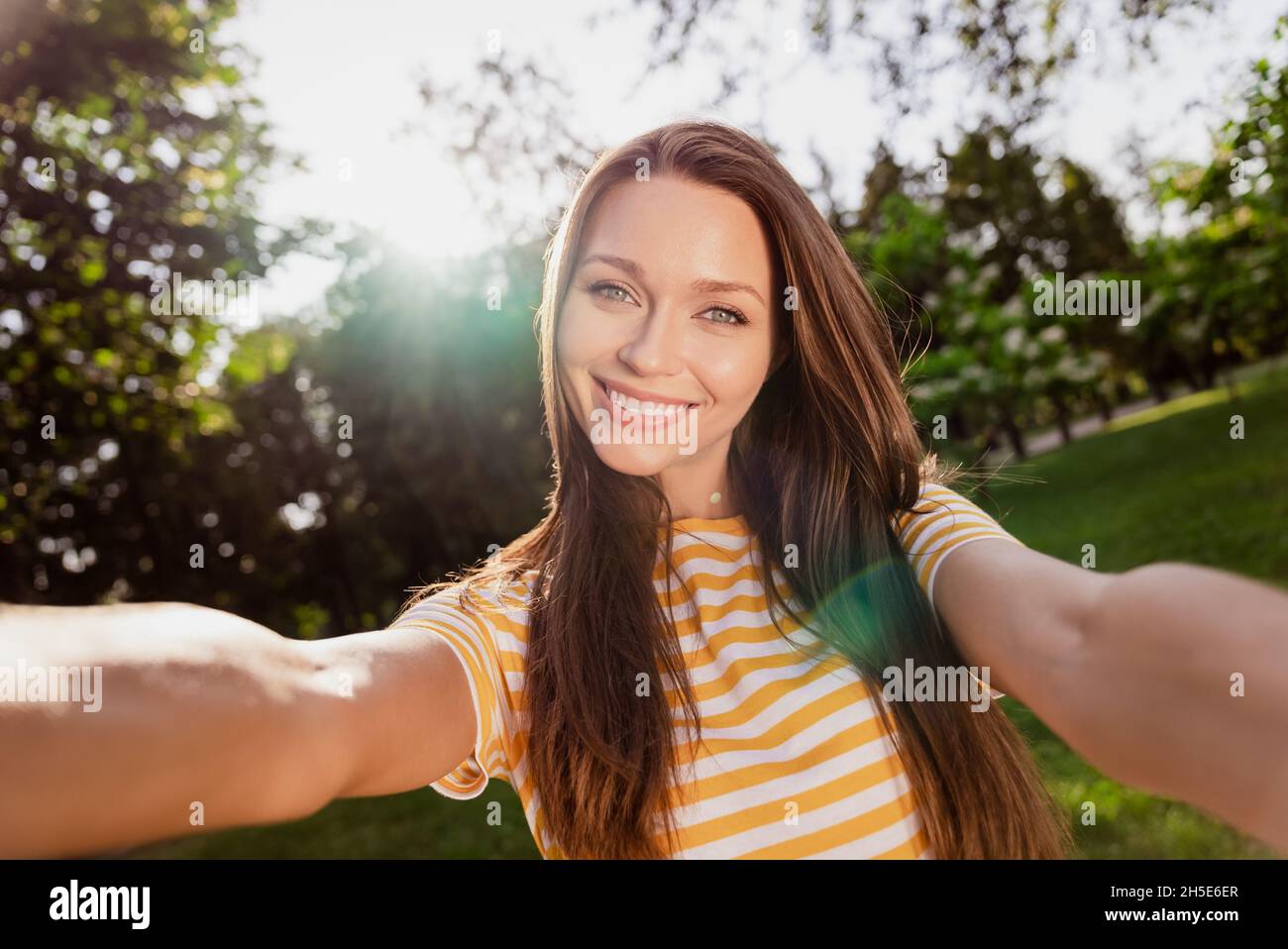 Self-portrait of attractive carefree cheerful girl enjoying holiday ...