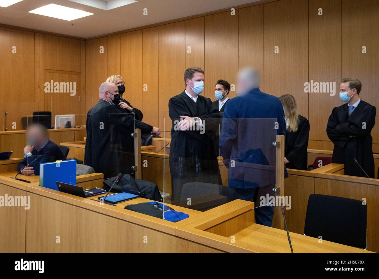 Aachen, Germany. 09th Nov, 2021. Two defendants (l and 3rd from right ...