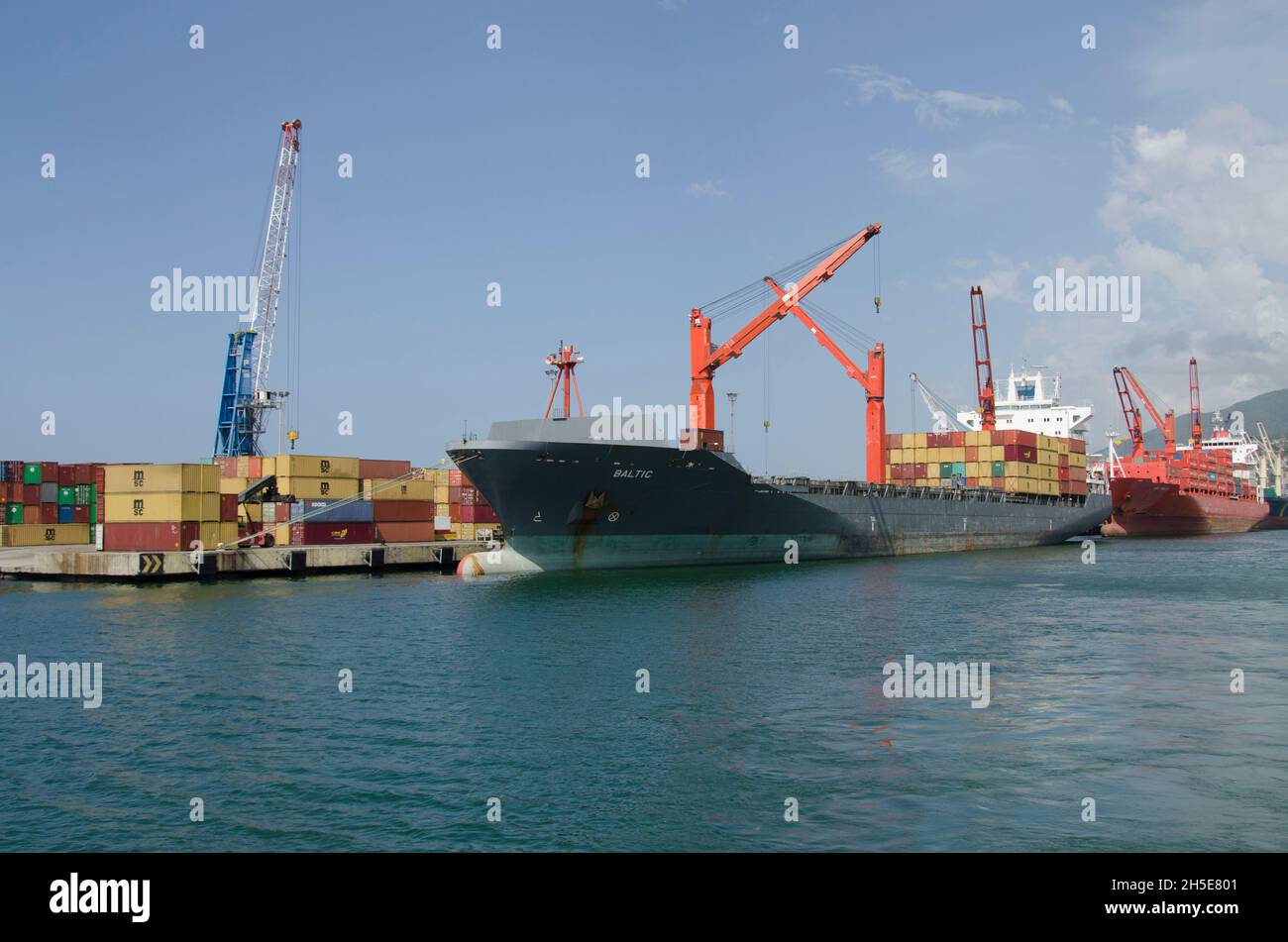 Moored container ship waiting for clearance to leave the harbor to ...