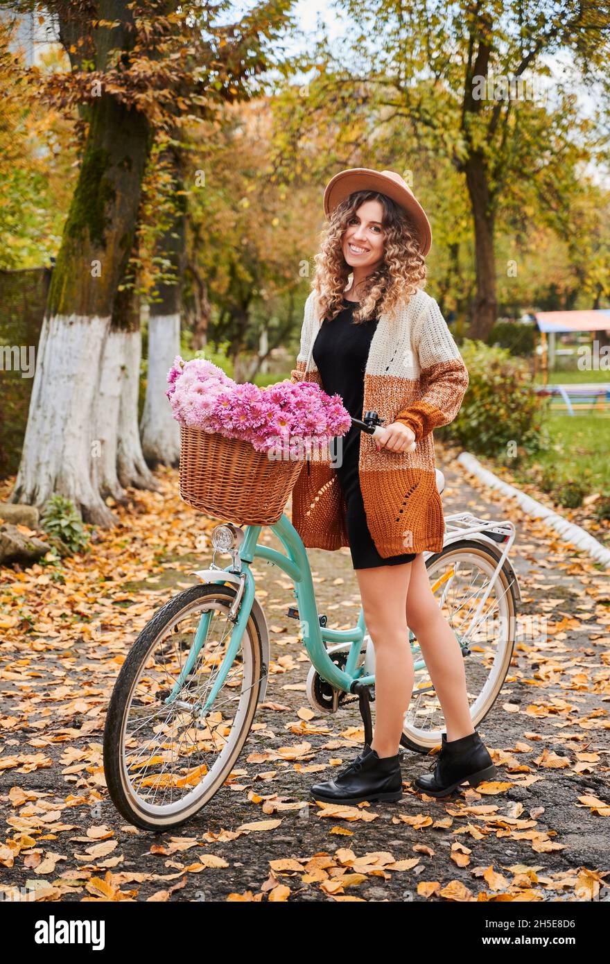 Elegant lady on bike hi-res stock photography and images - Alamy