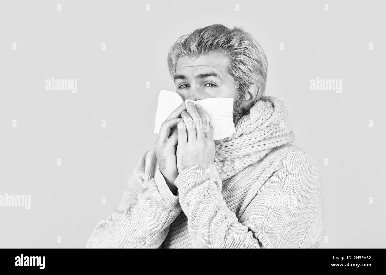 on a sick leave. immunity against epidemic. hipster sneezing and blow ...