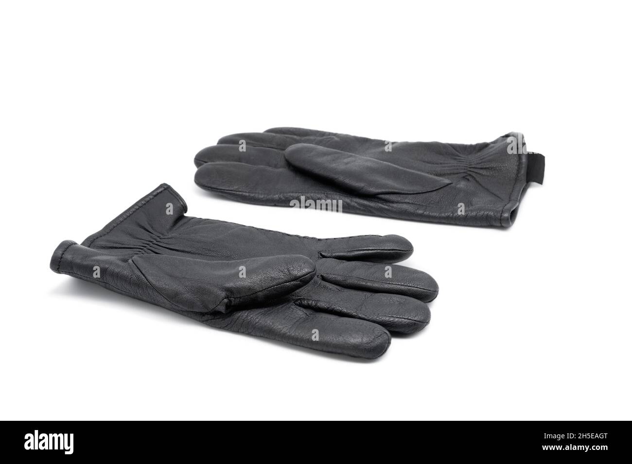 Leather black gloves. Close-up. Isolated over white background Stock ...