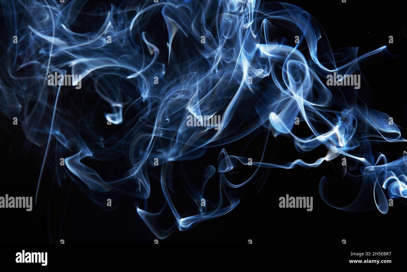 smoke on black background with abstract blur motion wave swirl . Wisp ...