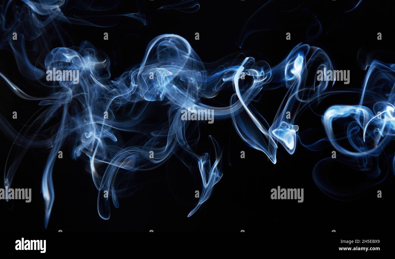 smoke on black background with abstract blur motion wave swirl . Wisp ...