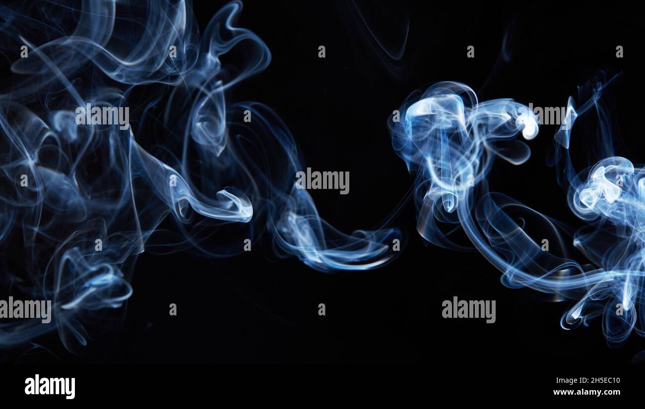 smoke on black background with abstract blur motion wave swirl . Wisp ...