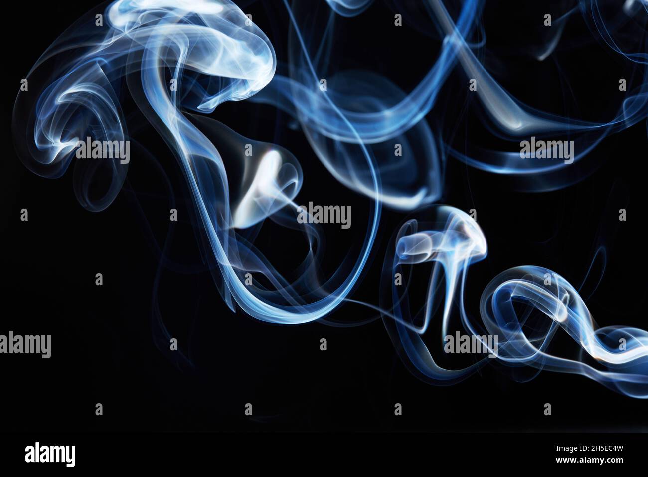 smoke on black background with abstract blur motion wave swirl . Wisp ...