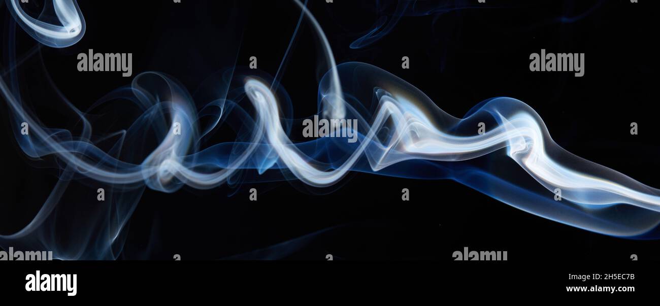 smoke on black background with abstract blur motion wave swirl . Wisp ...