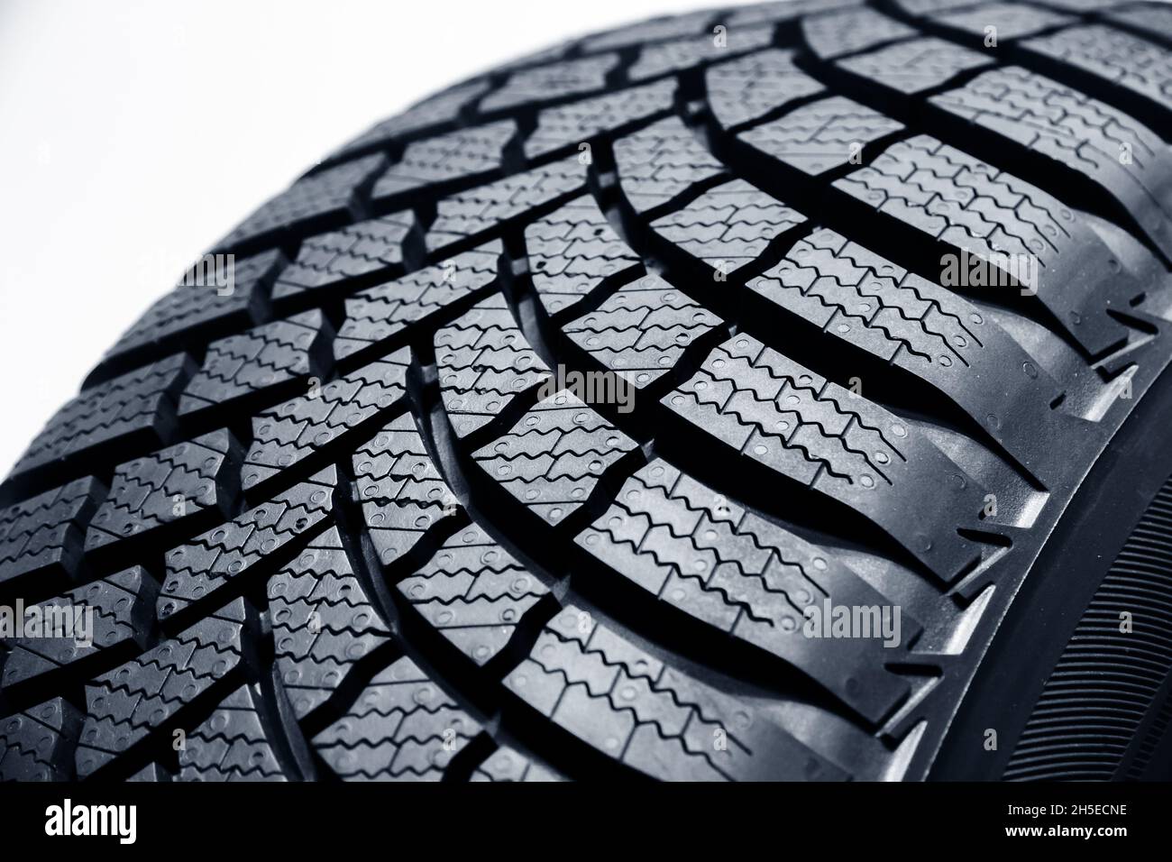 Close up profile modern car tyres Stock Photo - Alamy