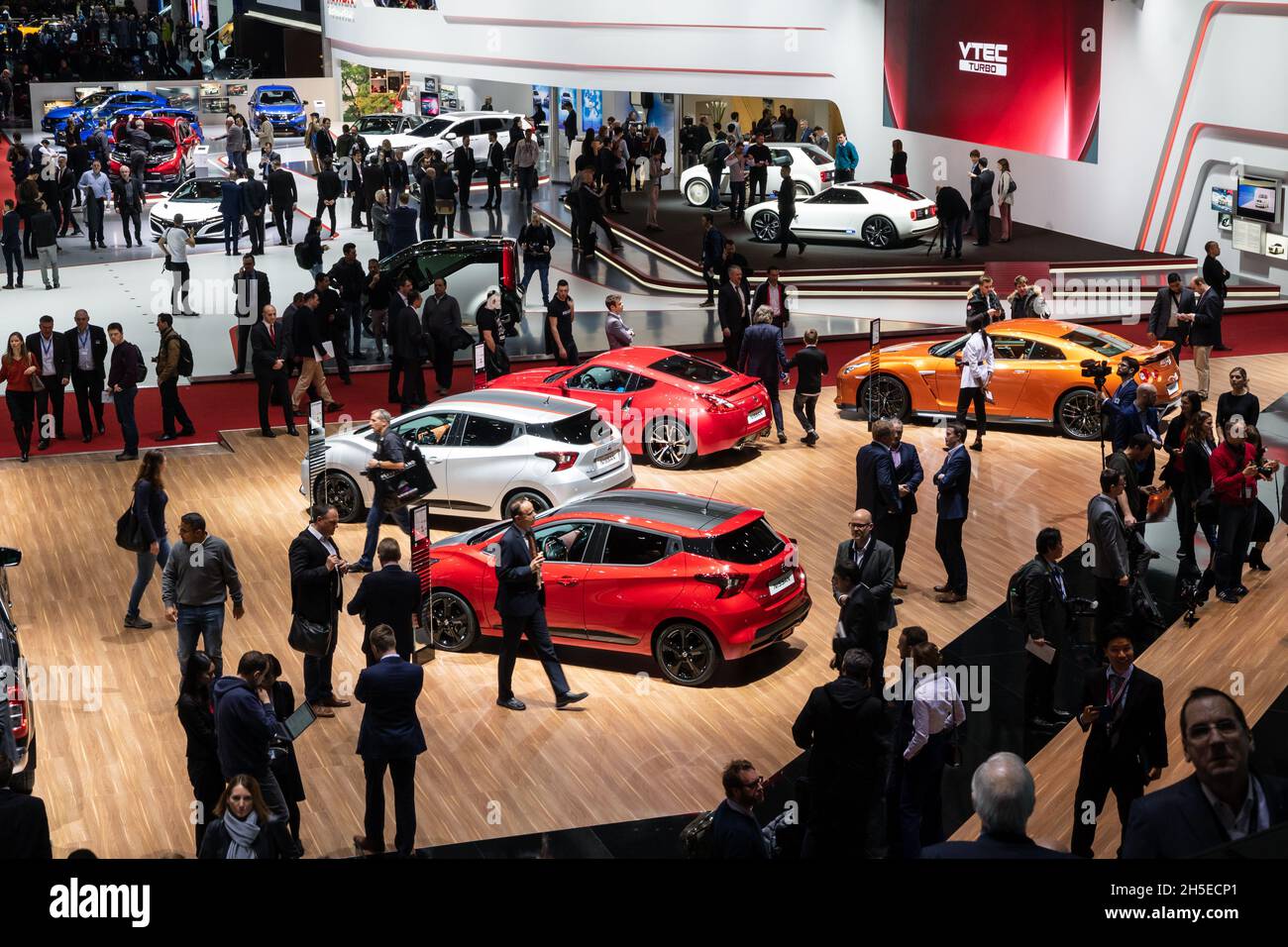 Visitors and cars at the 88th Geneva International Motor Show ...
