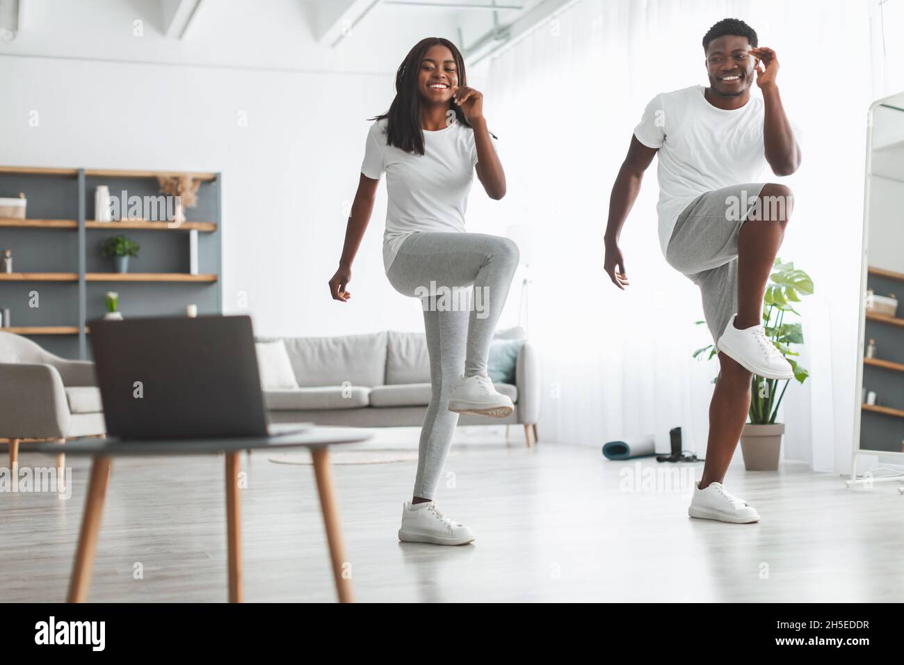 Elbow to knee twist hi-res stock photography and images - Alamy