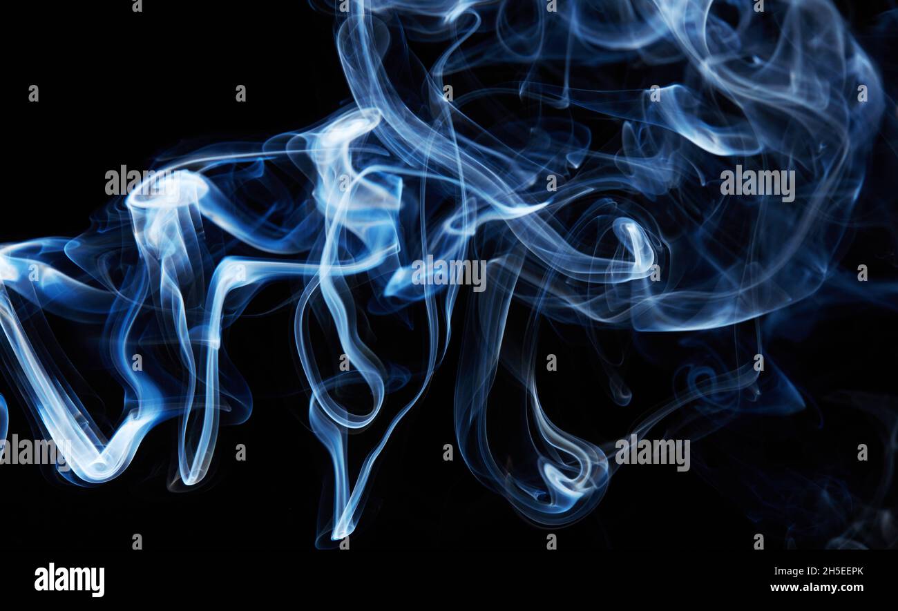 blue smoke on black background with abstract blur motion wave swirl ...