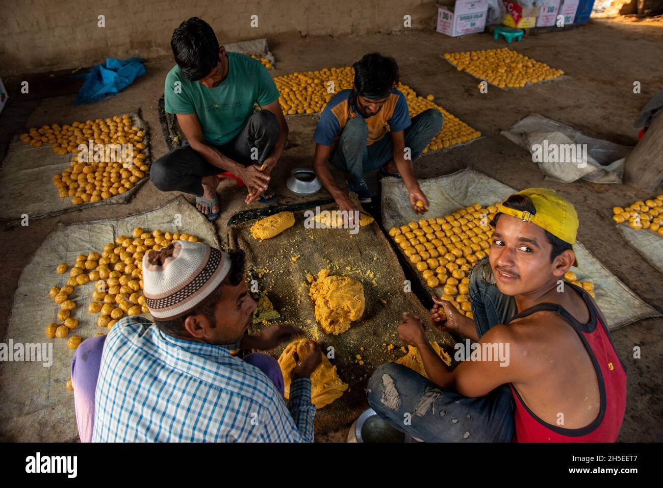 Roorkee, uttarakhand, India- Nov 7 2021: worker making fresh jaggery ...