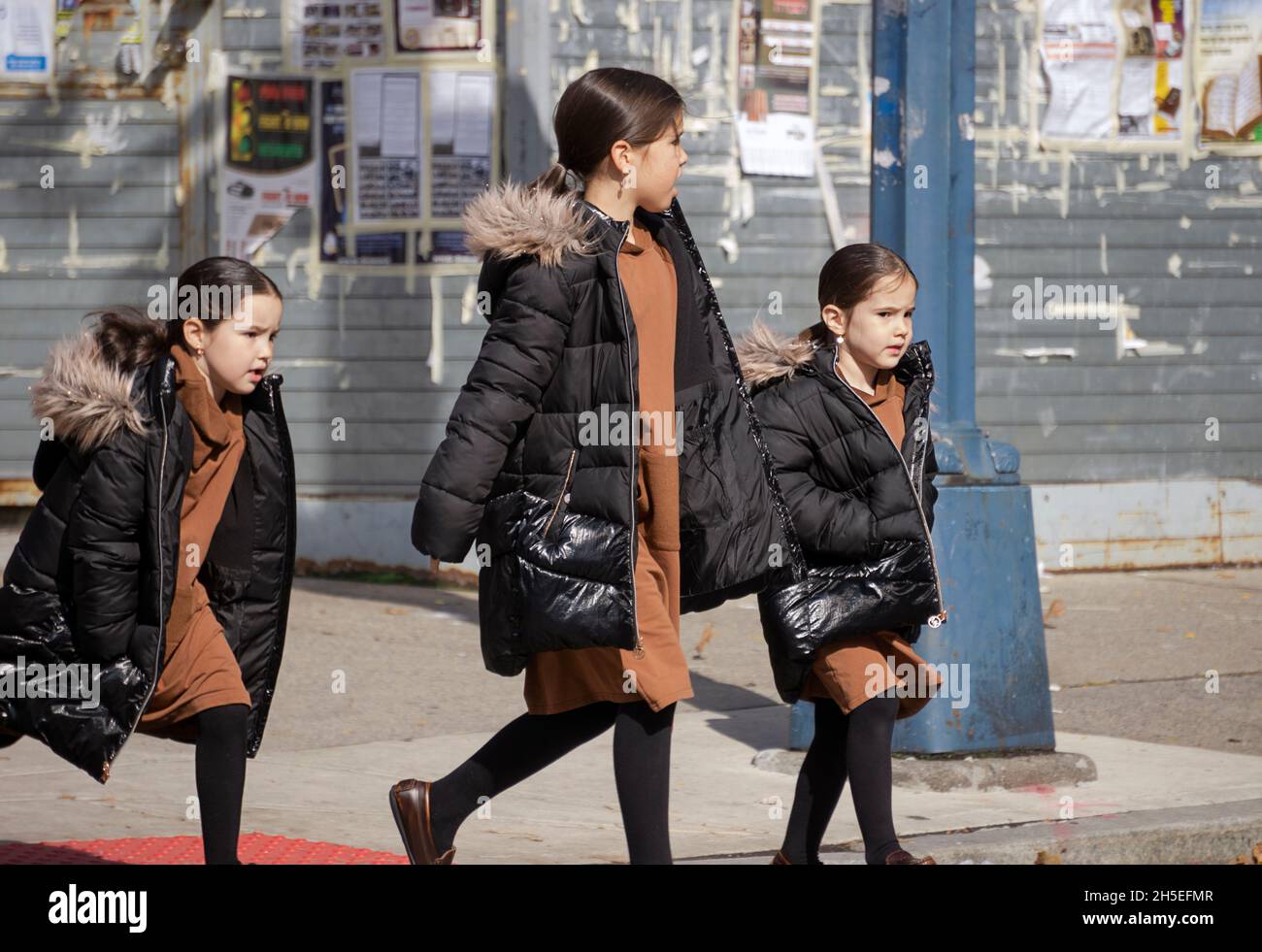 Hasidic Jewish sisters dressed identically. Walking on Lee Avenue in ...