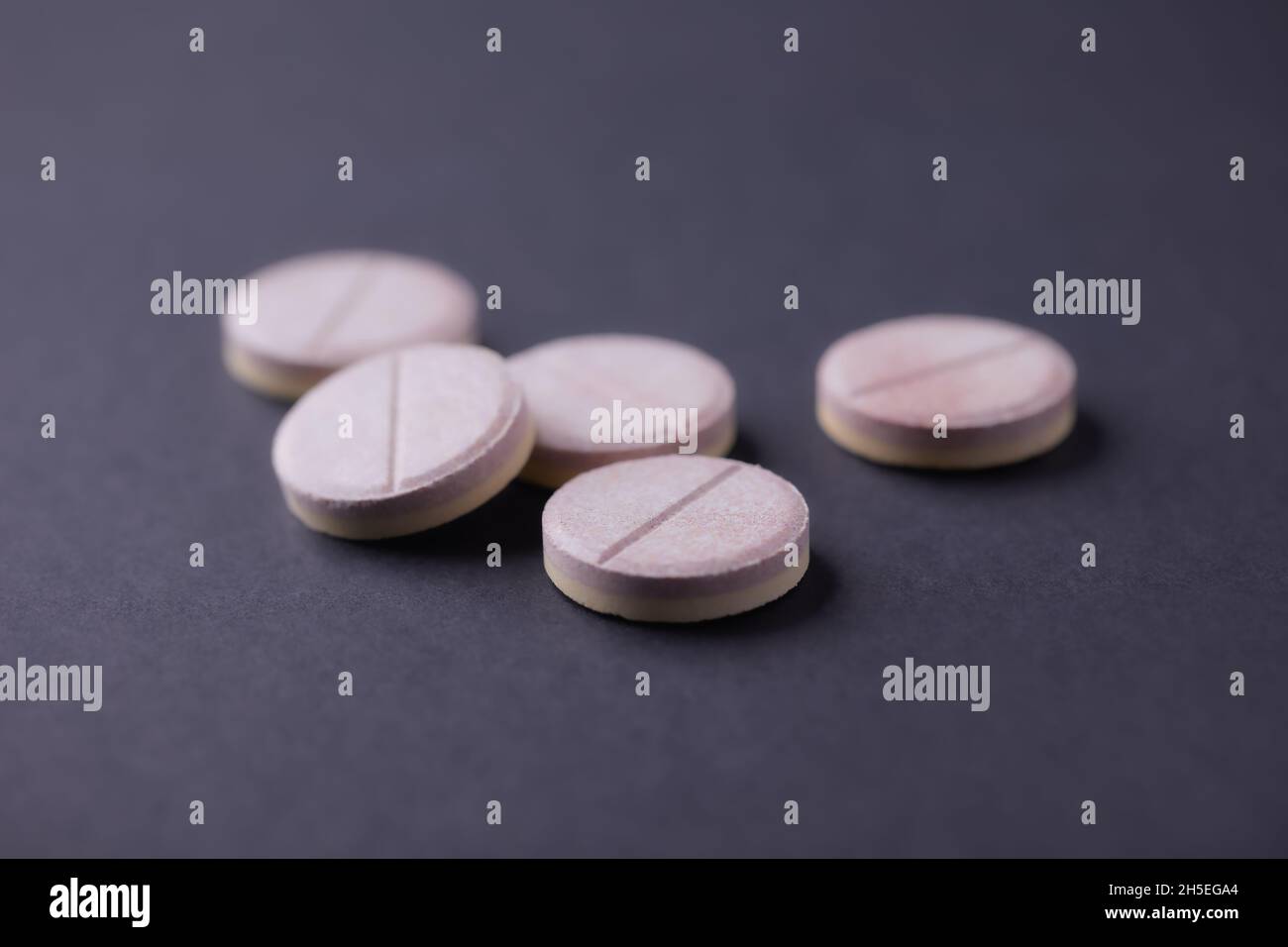 Vitamin effervescent Tablets on paper background. Close up. Copy space ...