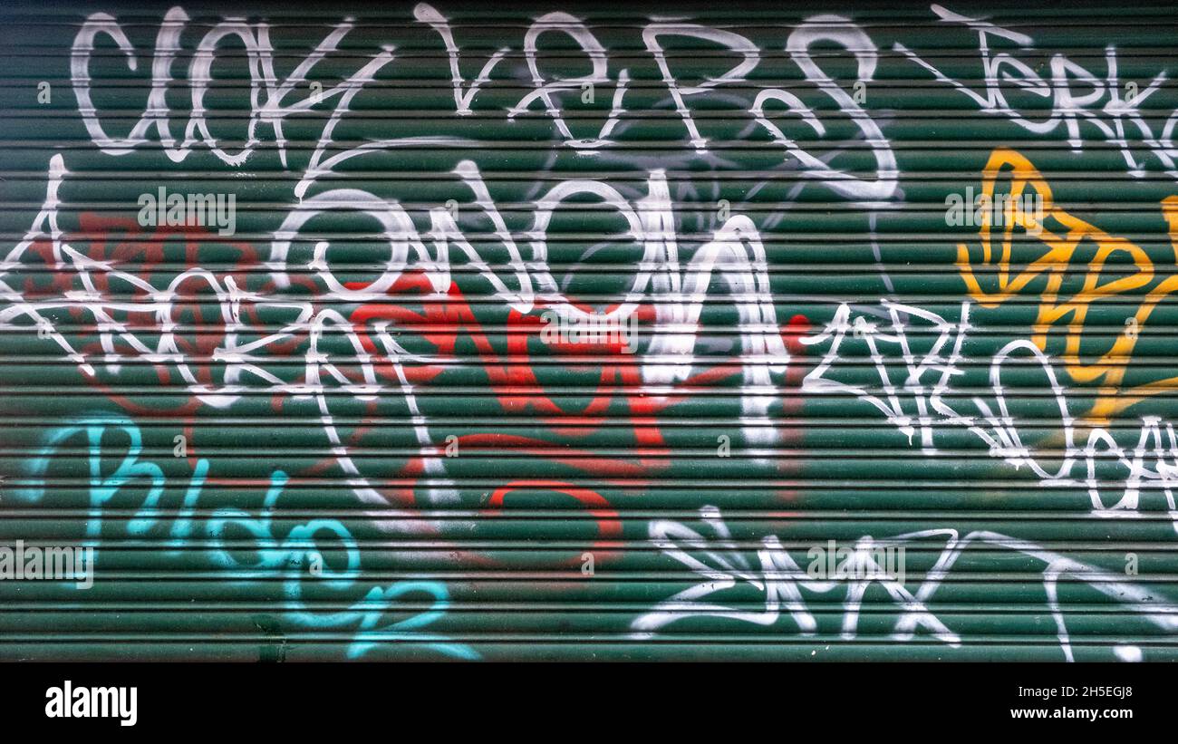 Graffiti on door shutter street hi-res stock photography and images - Alamy