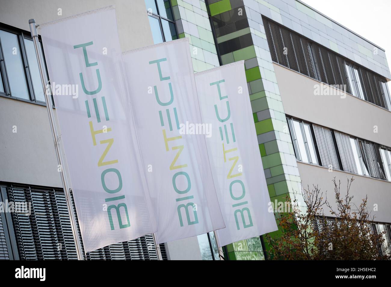 Mainz, Germany. 09th Nov, 2021. The Biontech logo is on flags outside ...
