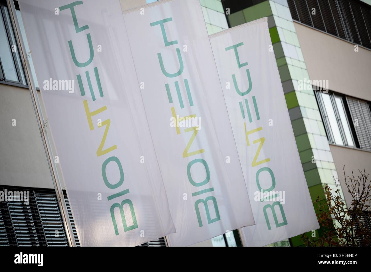 Mainz, Germany. 09th Nov, 2021. The Biontech logo is on flags outside ...
