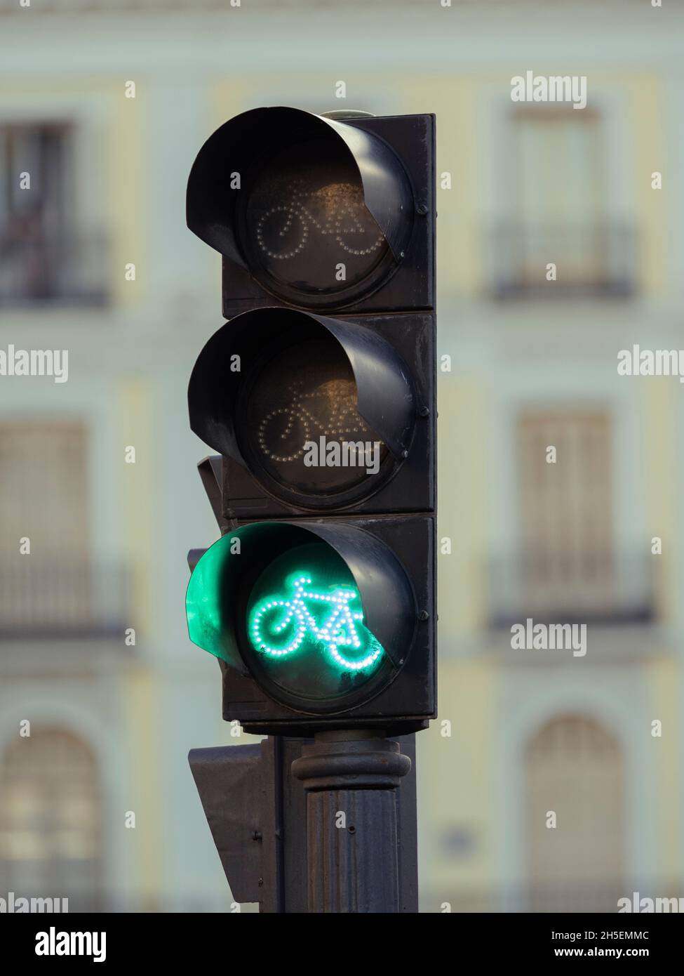 Green traffic light on a street. Let's go forward Stock Photo - Alamy