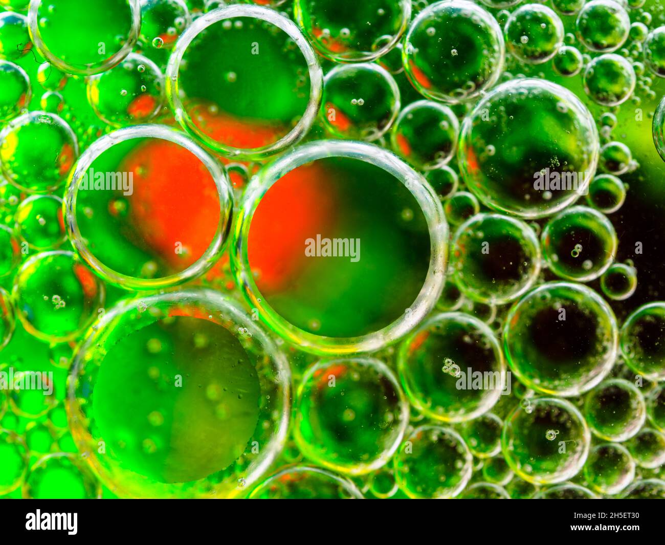 Oil bubbles in water Stock Photo - Alamy