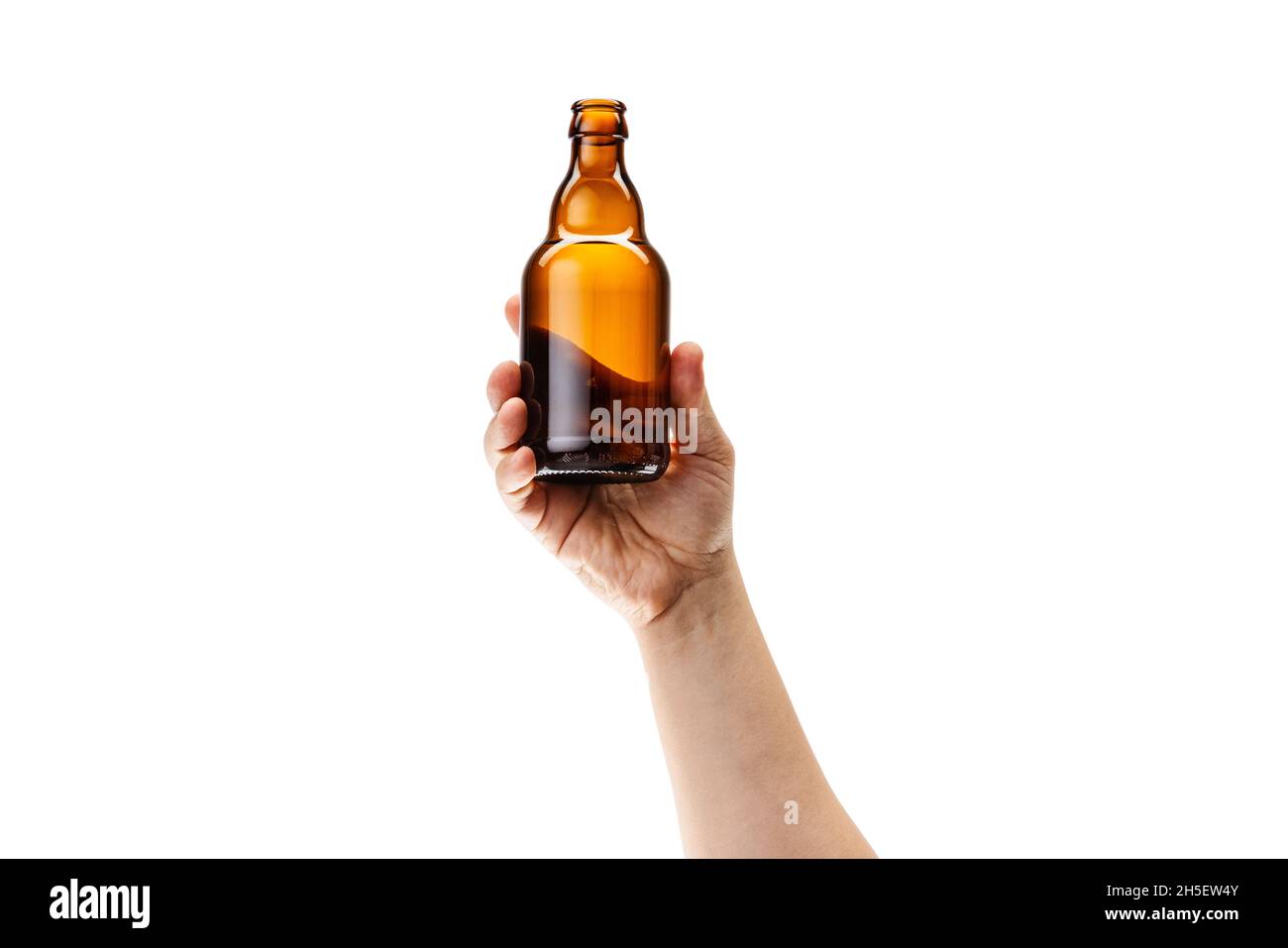 Cropped image of male hand holding bottle of strong alcohol drink, beer ...