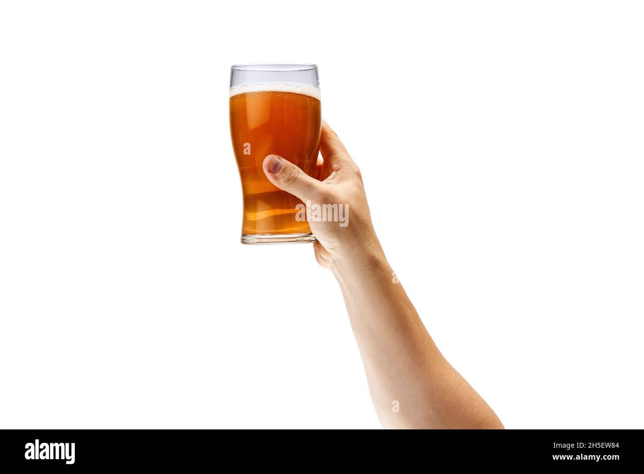 Cropped image of male hand holding glass of lager foamy beer isolated ...