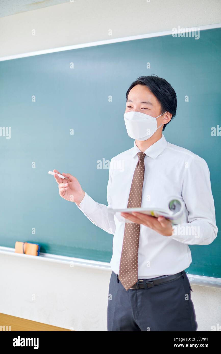 Japanese school teacher Stock Photo - Alamy