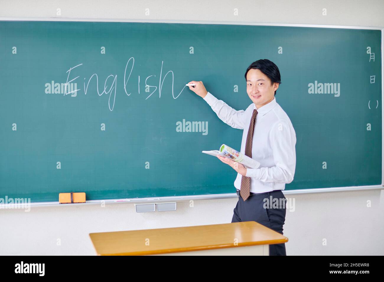 Japanese school teacher Stock Photo - Alamy