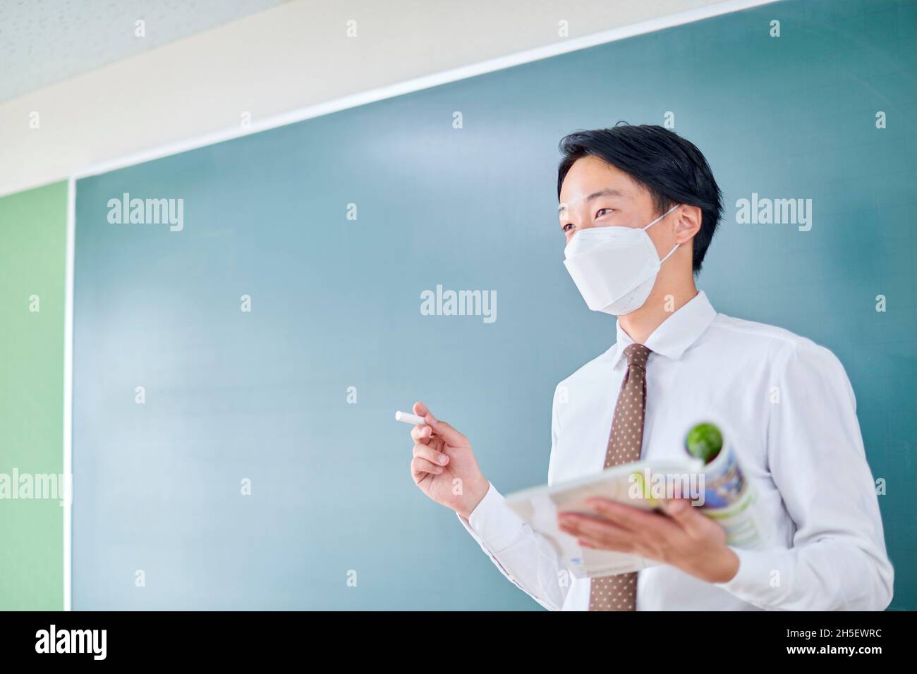 Japanese school teacher Stock Photo - Alamy