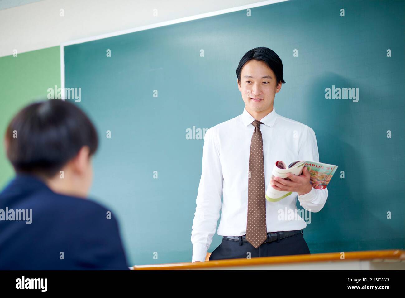Japanese school students having lesson in the classroom Stock Photo - Alamy