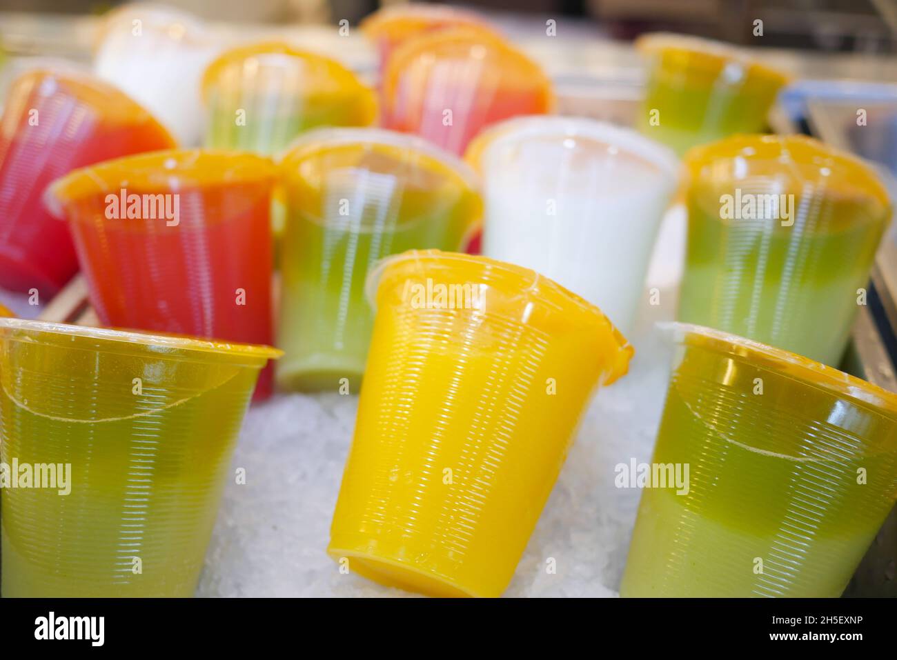 plastic bottles of different juice Stock Photo - Alamy